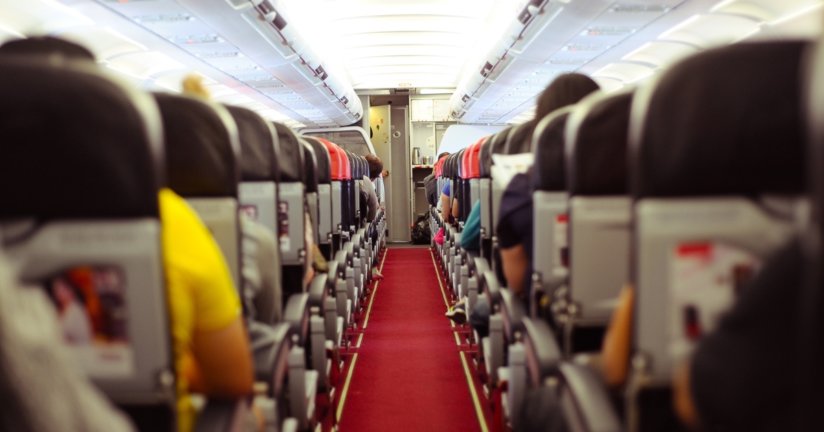 Woman tries to open plane door mid-flight because ‘Jesus told her to do ...