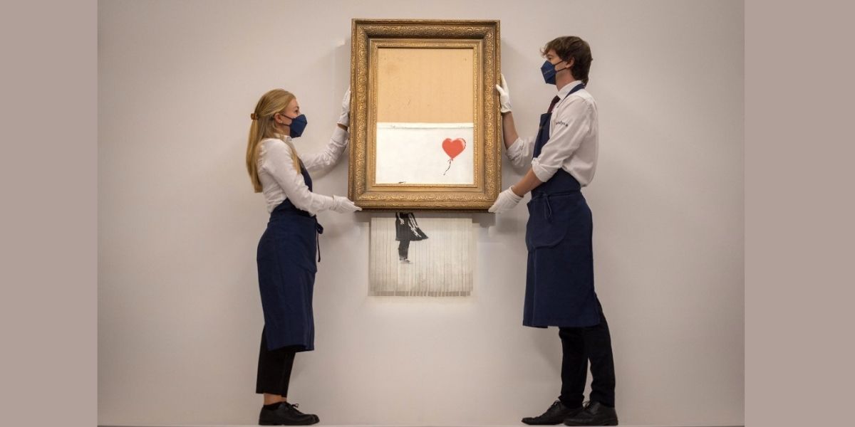 Banksy’s iconic half-shredded painting from 2018 is up for auction ...